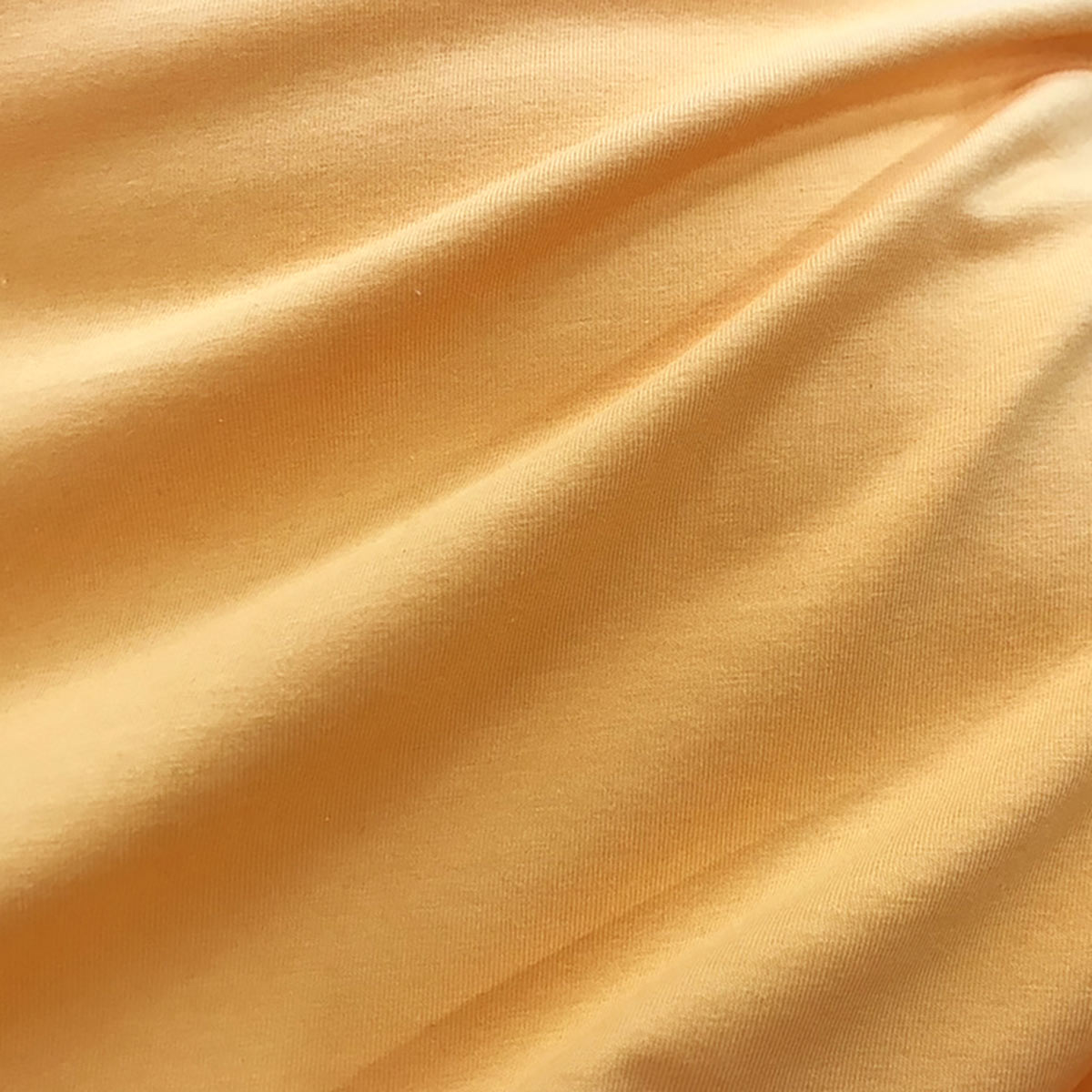 Single jersey stretch in mango colour