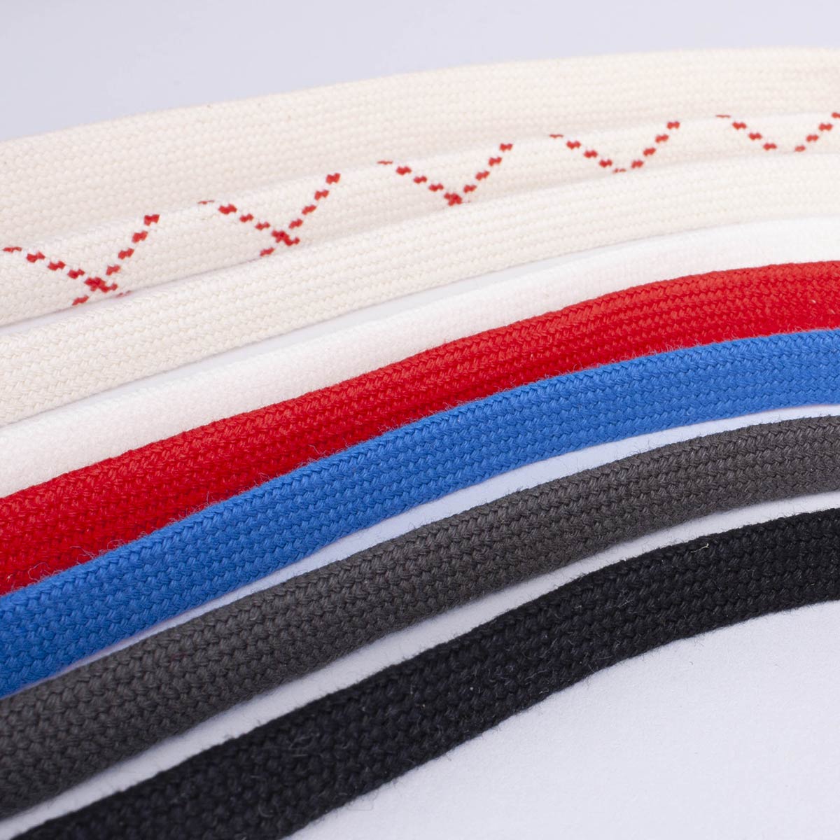 Samples of organic cotton tubular ribbon